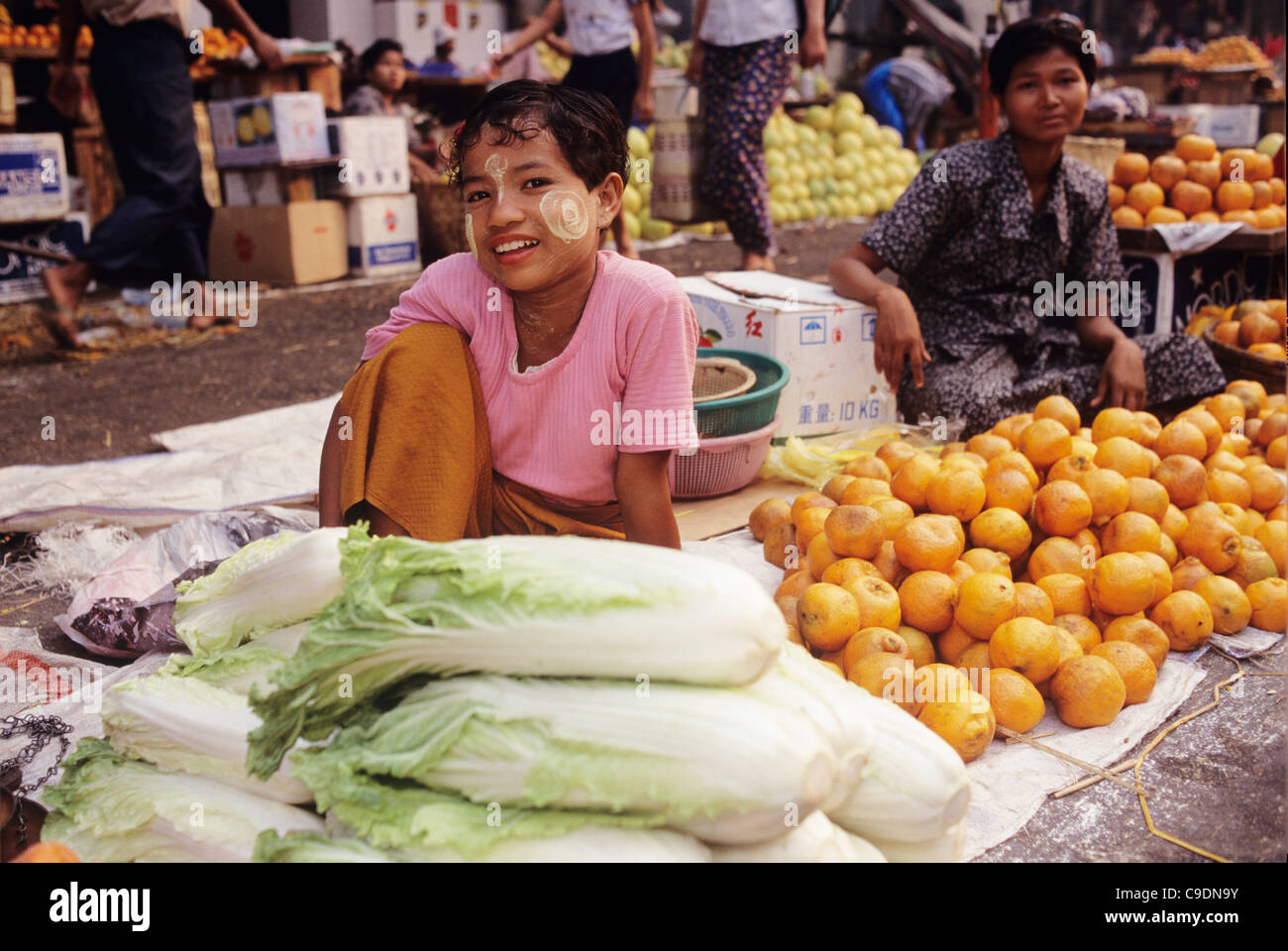 Yangon's New Year markets in downtown, young female merchant poses for ...