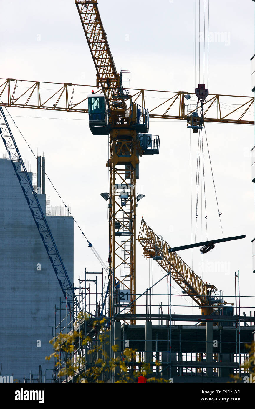 Construction site of a new administration building. Construction cranes ...