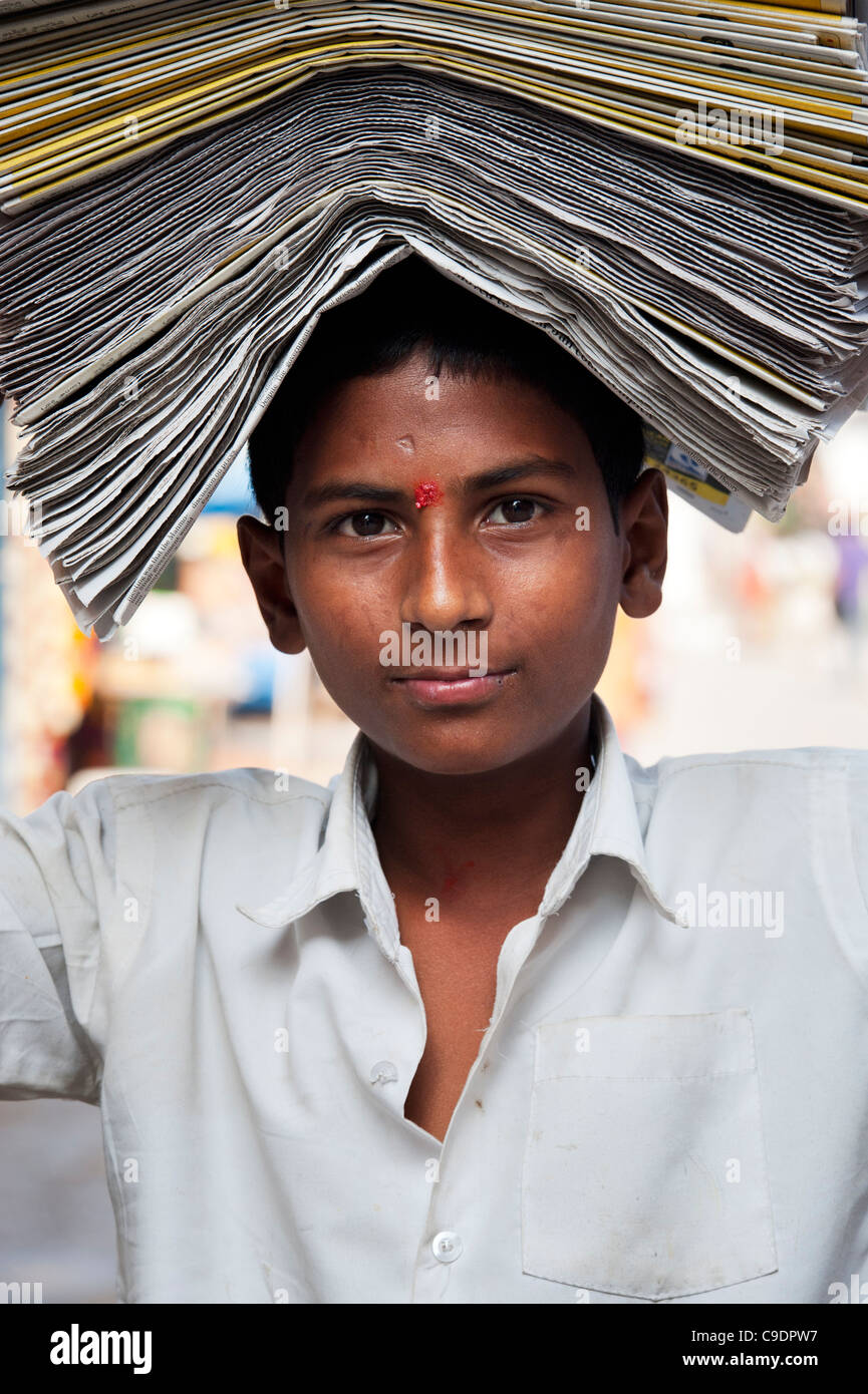 Indian paper boy with papers on his head. Andhra Pradesh, India Stock ...