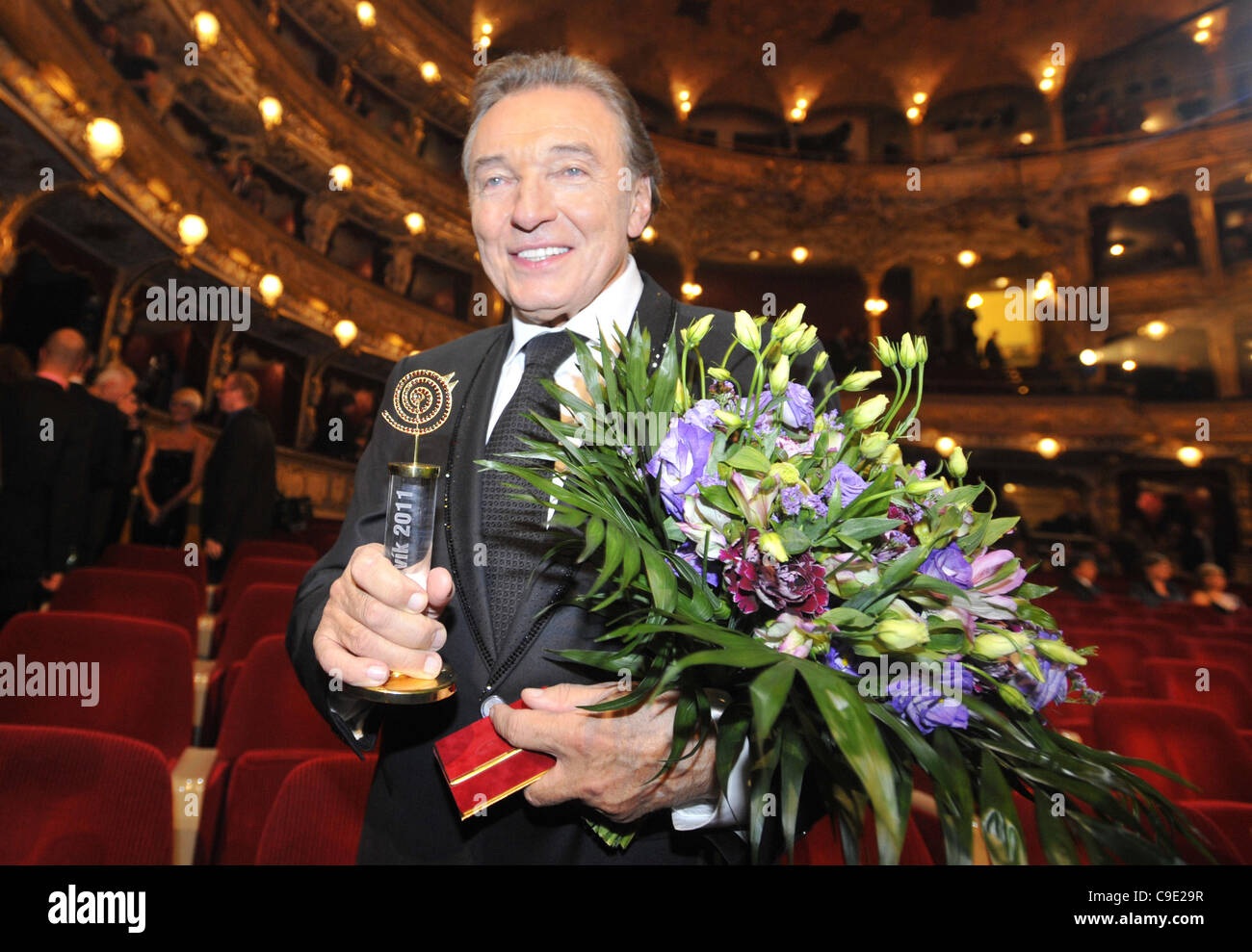 Czech pop music singers Karel Gott poses after he received the Golden ...