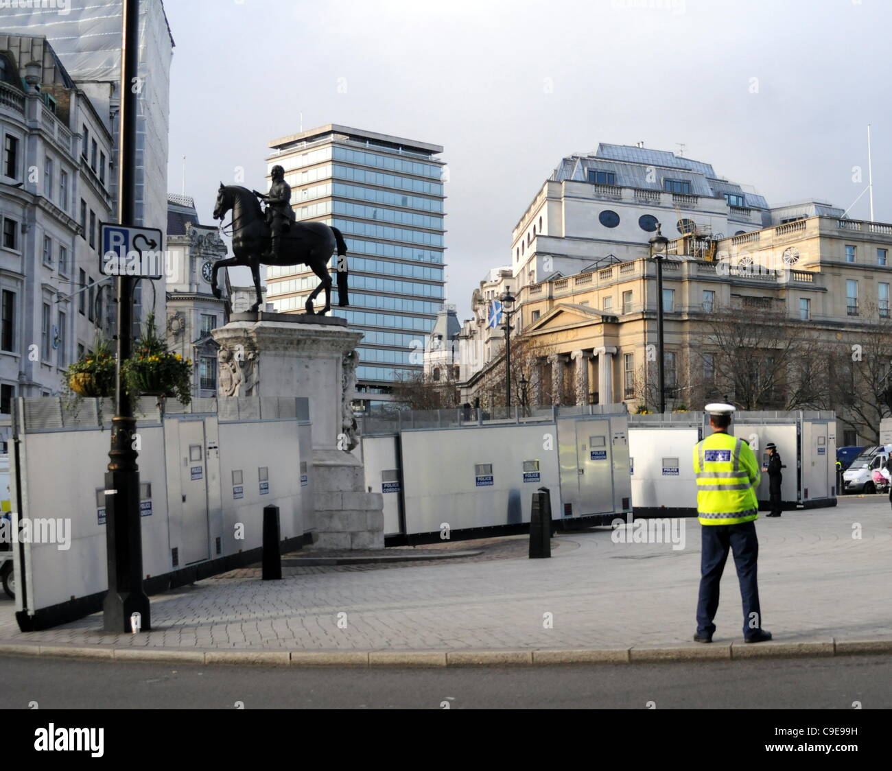 Police containment barriers block off Trafalgar Square and Whitehall in ...
