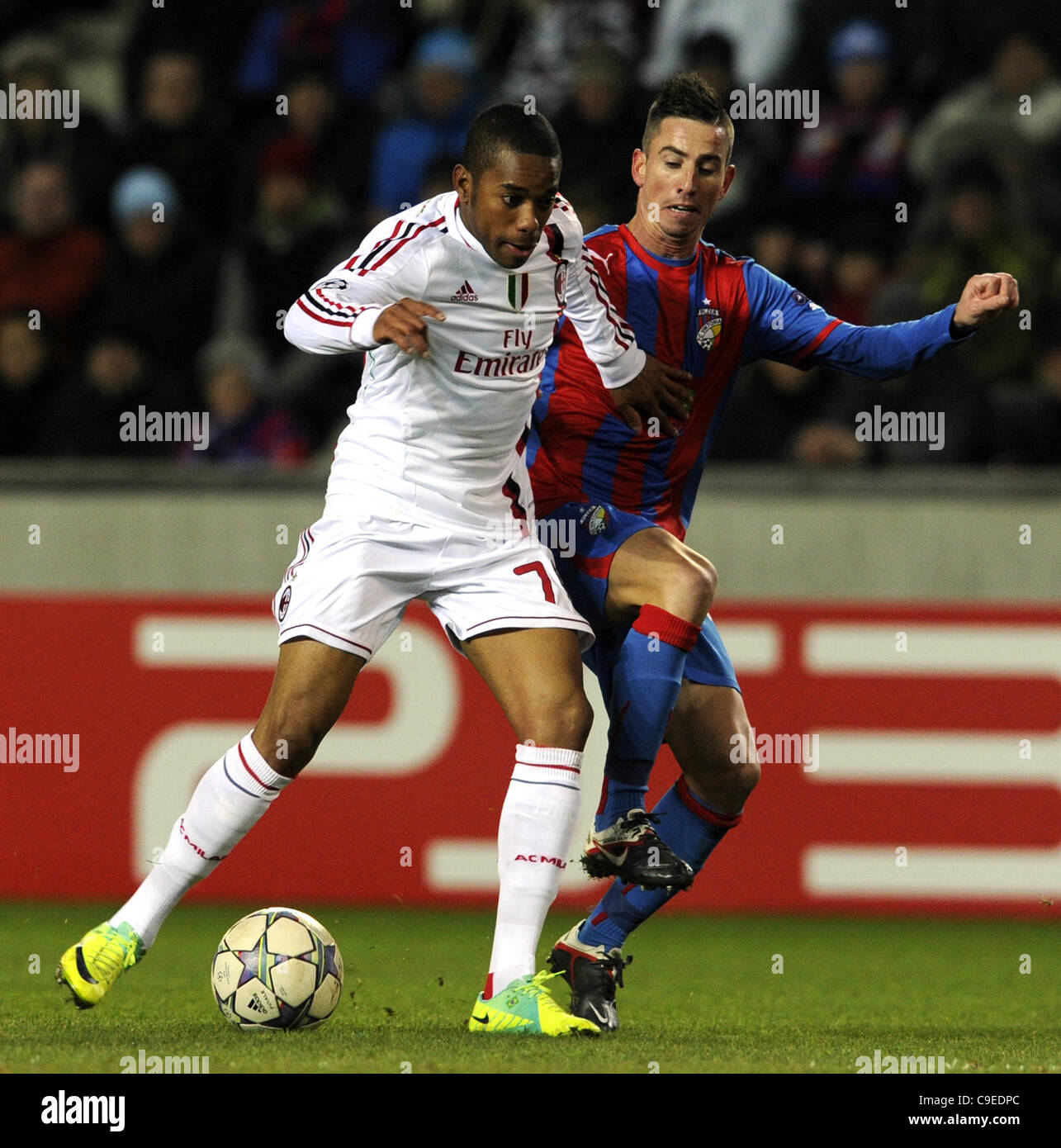 Robinho of Milan (left) and Milan Petrzela of Viktoria during their ...