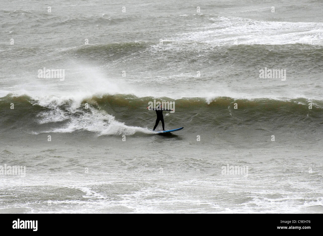 Surfers making the most of the large storm surf rolling into Langland ...