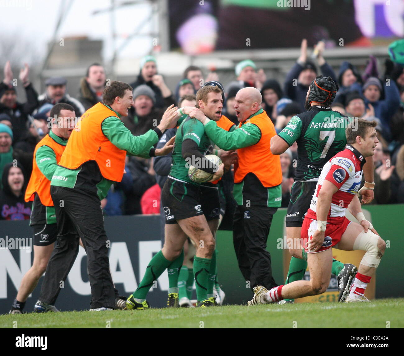 10.12.2011. Galway, Ireland. Connacht's Gavin Duffy is mobbed by team ...