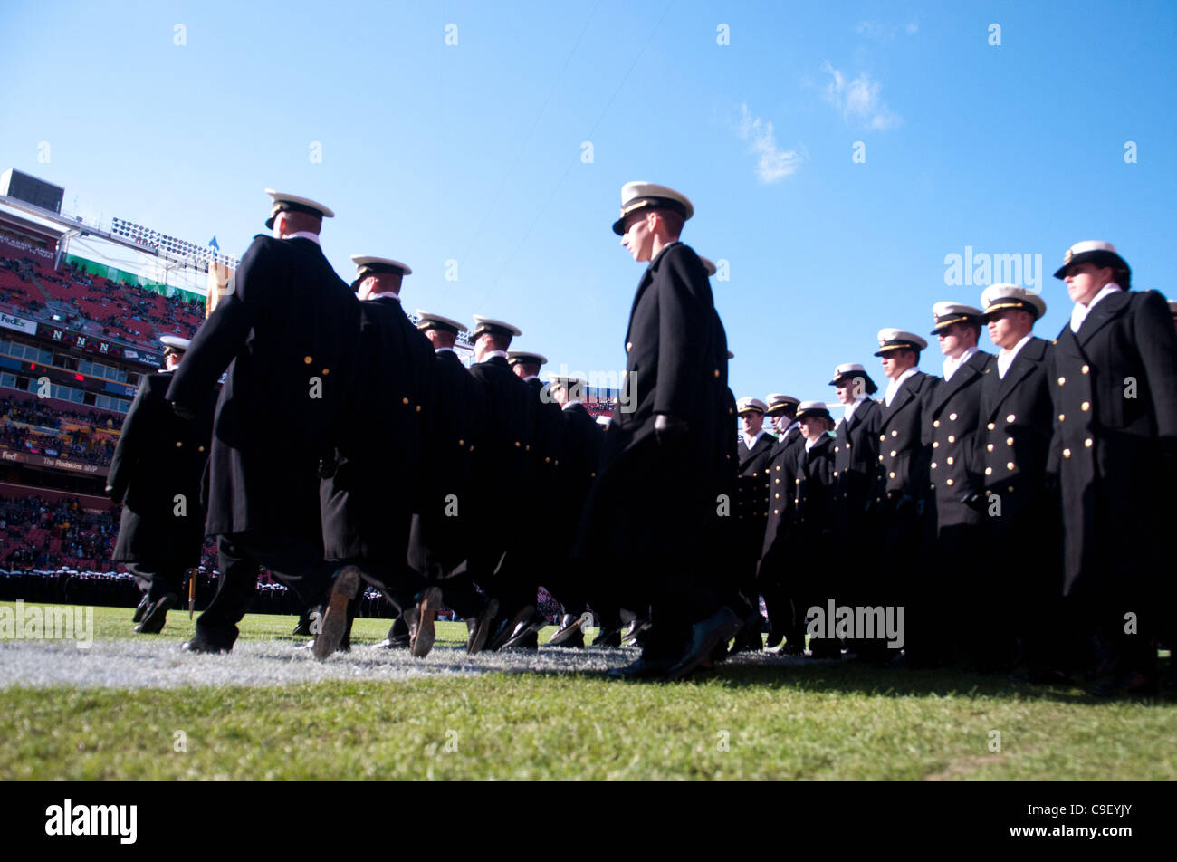 Cadets from the United States Naval Academy march on to the field at ...