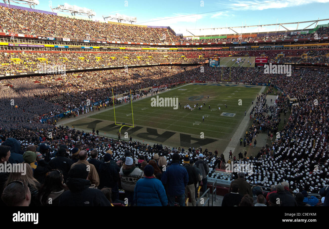 Fans watch action in the first half of the Army-Navy game on Saturday ...