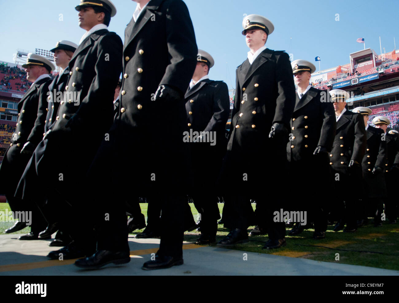 Cadets from the United States Naval Academy march on to the field at ...