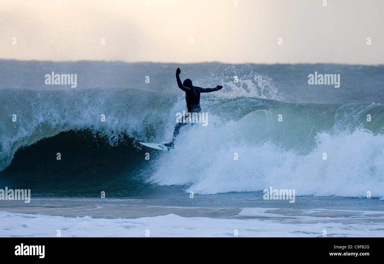 13th Dec 2011 - Swansea, UK - Local surfer Simon Blower making the most ...