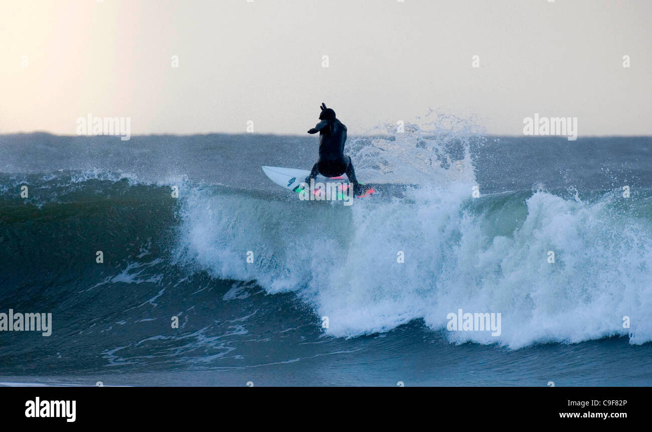 13th Dec 2011 - Swansea, UK - Local surfer Simon Blower making the most ...