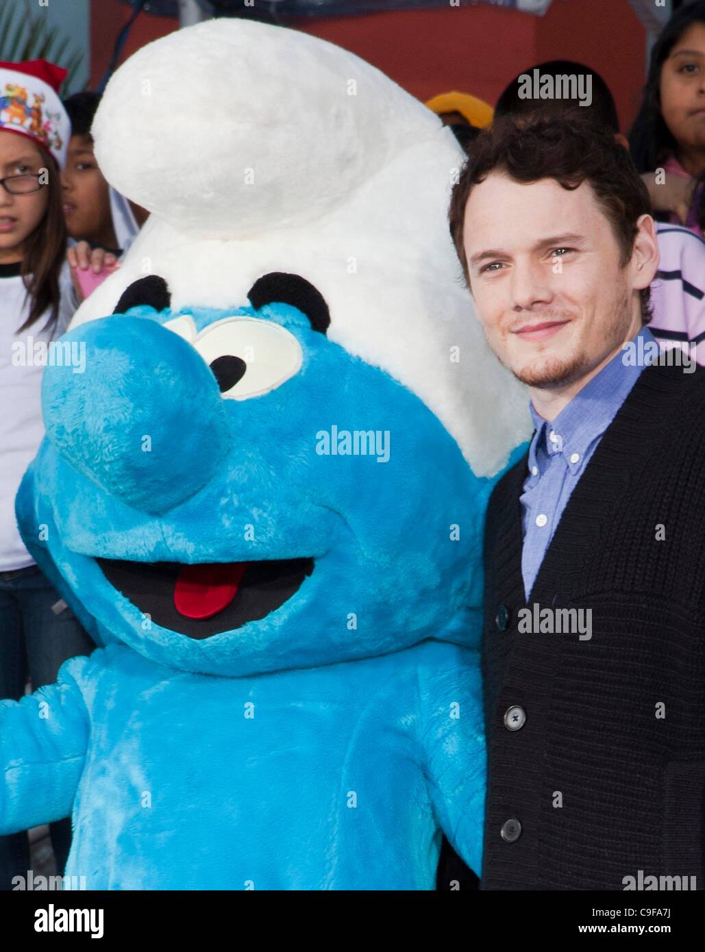 Anton Yelchin at the induction ceremony for The Smurfs Handprint ...