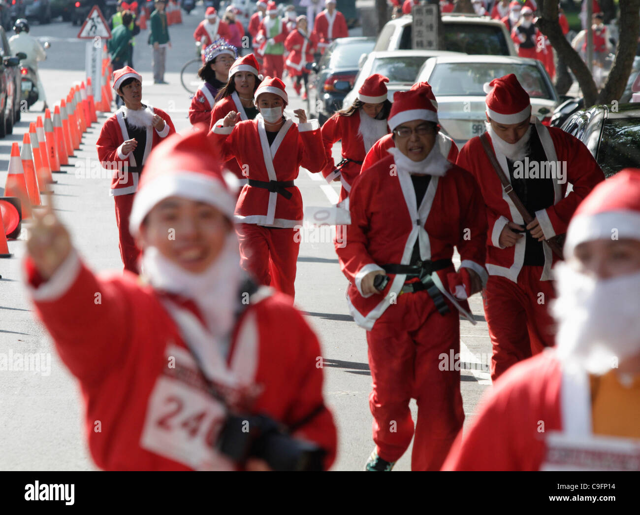 Near 3,000 Santa Claus run on street for Santa Go, taking place in ...