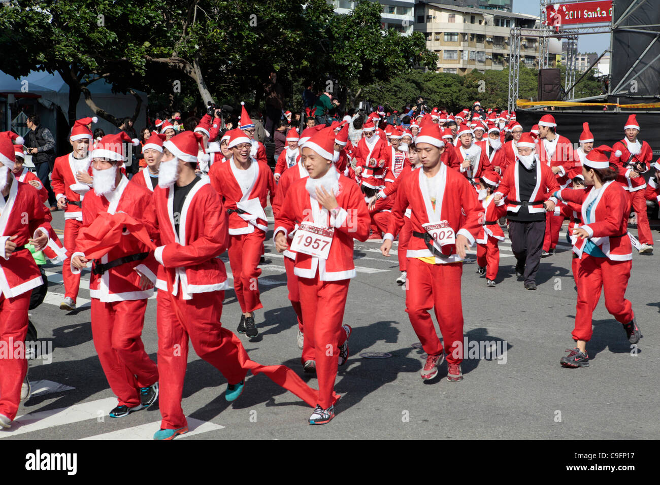Near 3,000 Santa Claus run on street for Santa Go, taking place in ...
