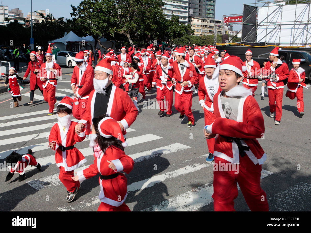 Near 3,000 Santa Claus run on street for Santa Go, taking place in ...