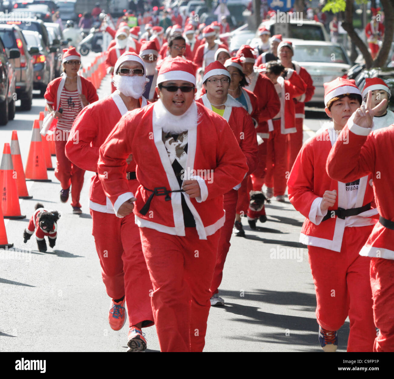 Near 3,000 Santa Claus run on street for Santa Go, taking place in ...