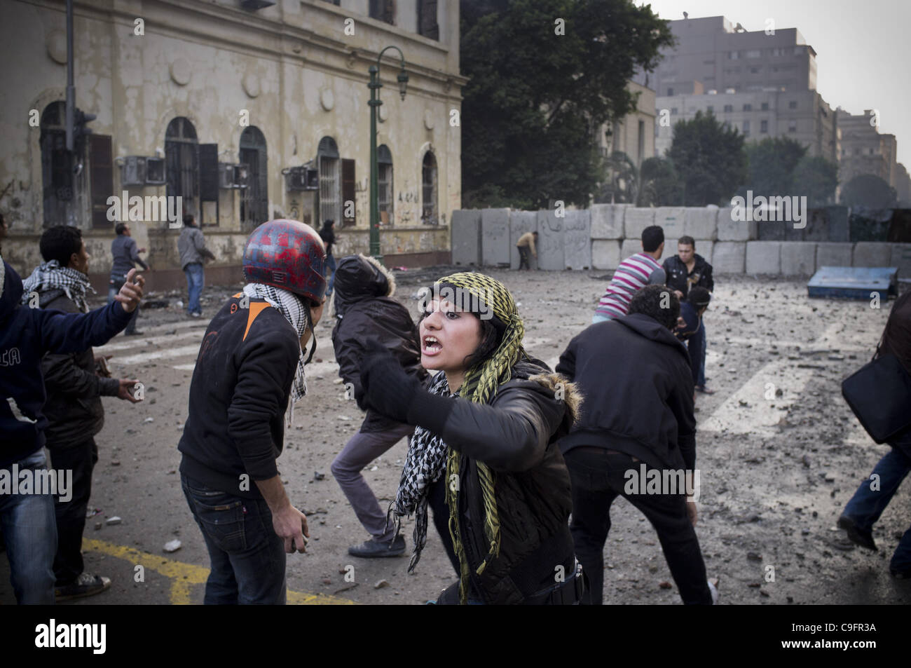 Dec. 17, 2011 - Cairo, Egypt - Protesters fight against Military police ...