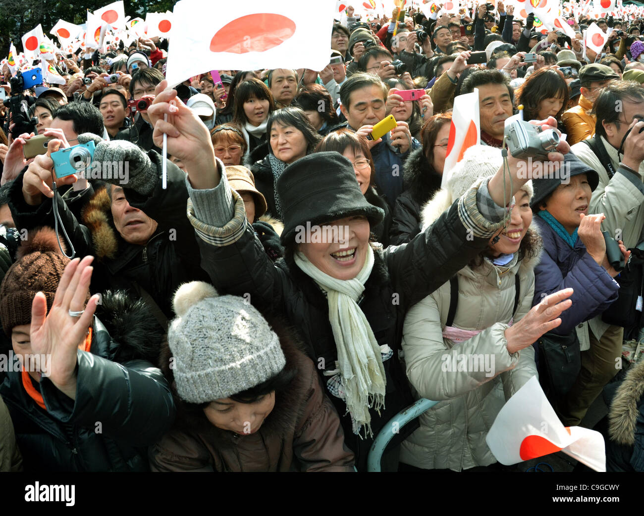 December 23, 2011, Tokyo, Japan - Well-wishers wave Japanese national ...