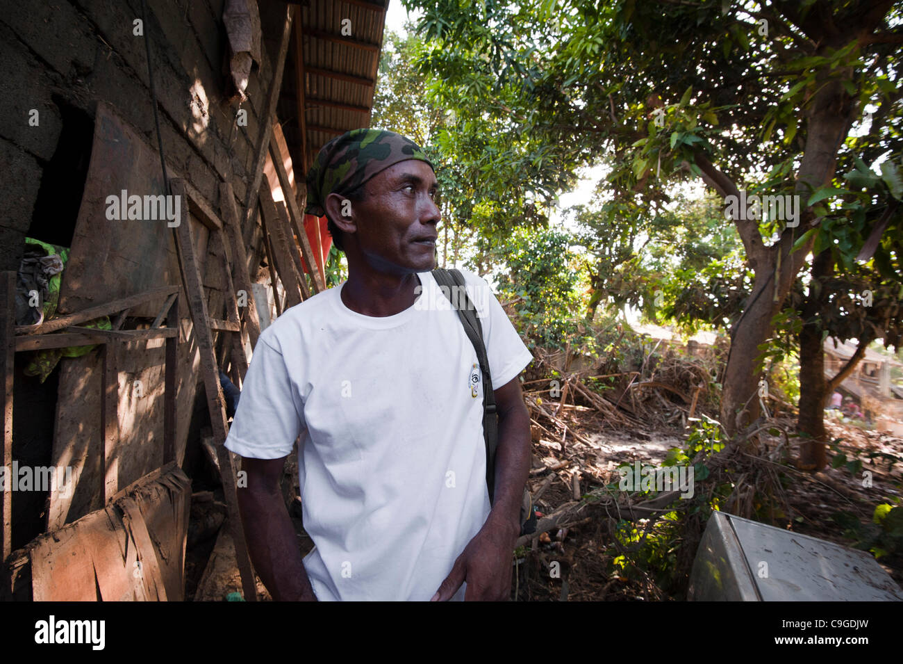 CAGAYAN DE ORO, PHILIPPINES. 23/12/2011. A man walking through a ...