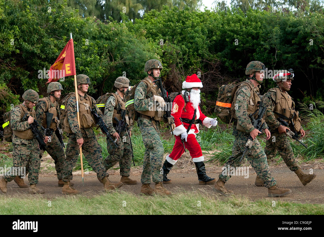 Santa Claus marches along with Marines from 2nd Battalion, 3rd Marine ...