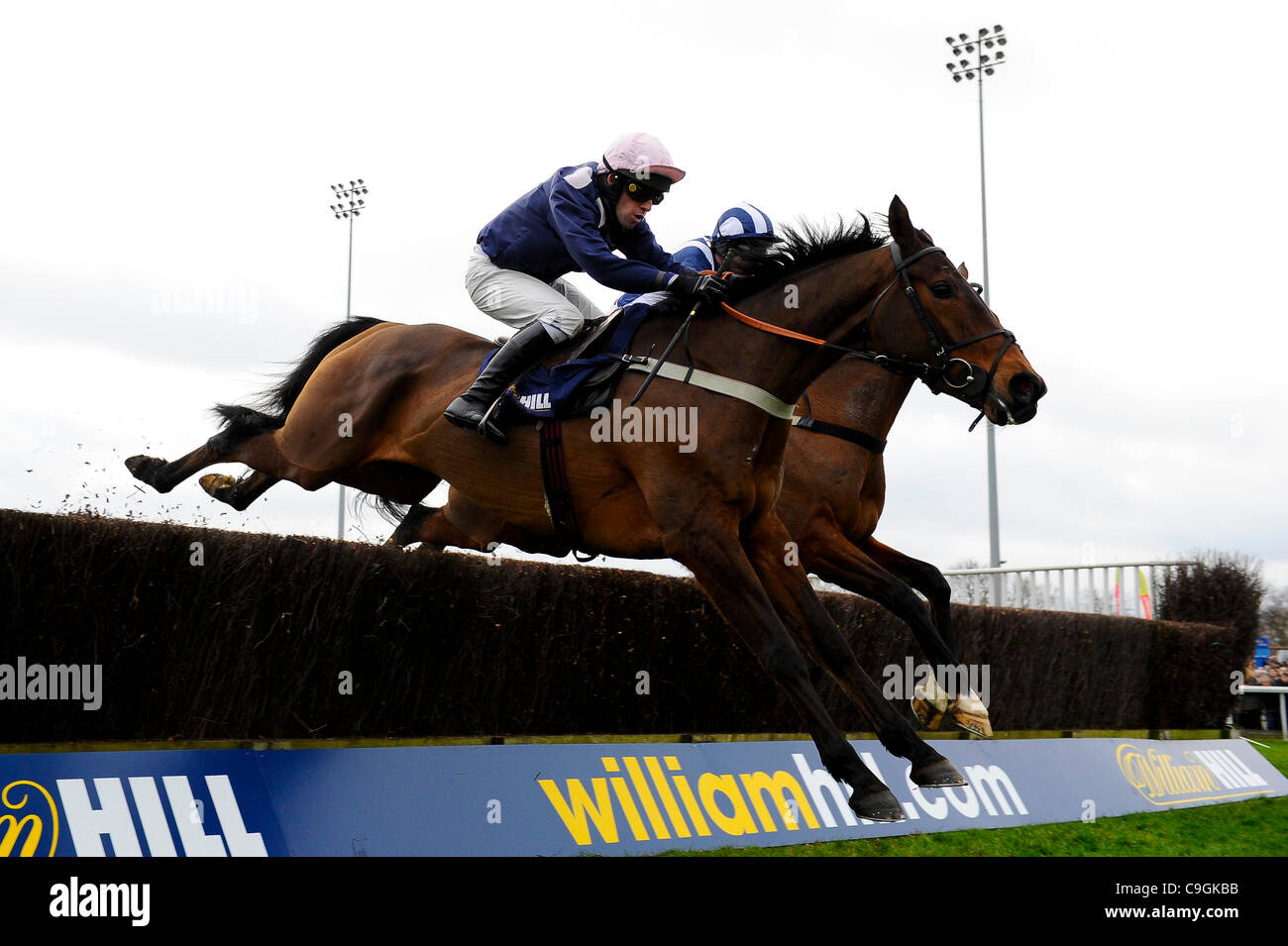 26.12.2011 Sunbury, England. Henry Oliver on Mr Moonshine (IRE) leads ...
