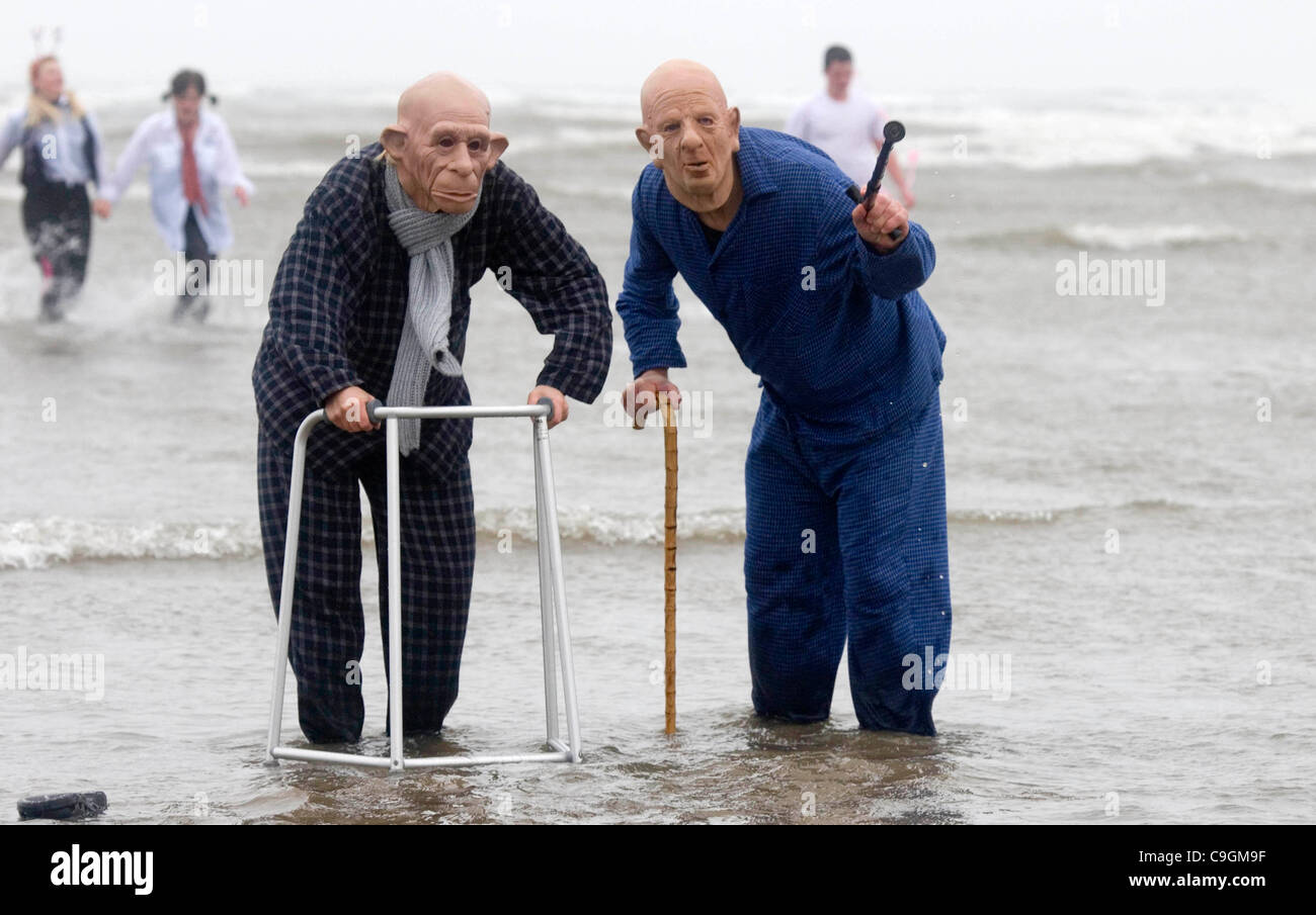 Pembrey, Llanelli, UK. 26th Dec, 2011. Debbie and John Price from ...