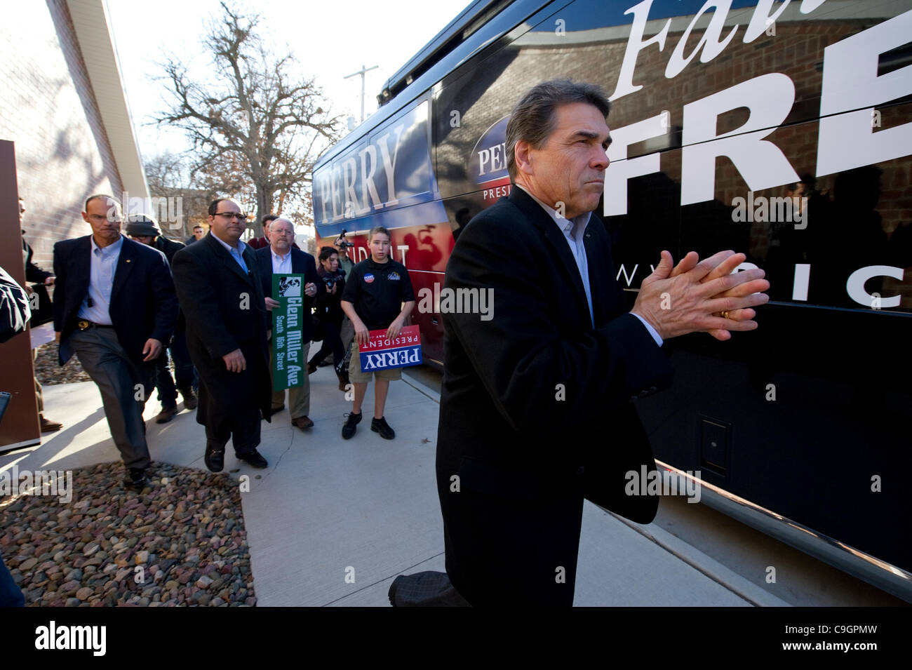 Republican presidential nominee candidate Rick Perry walks from his ...