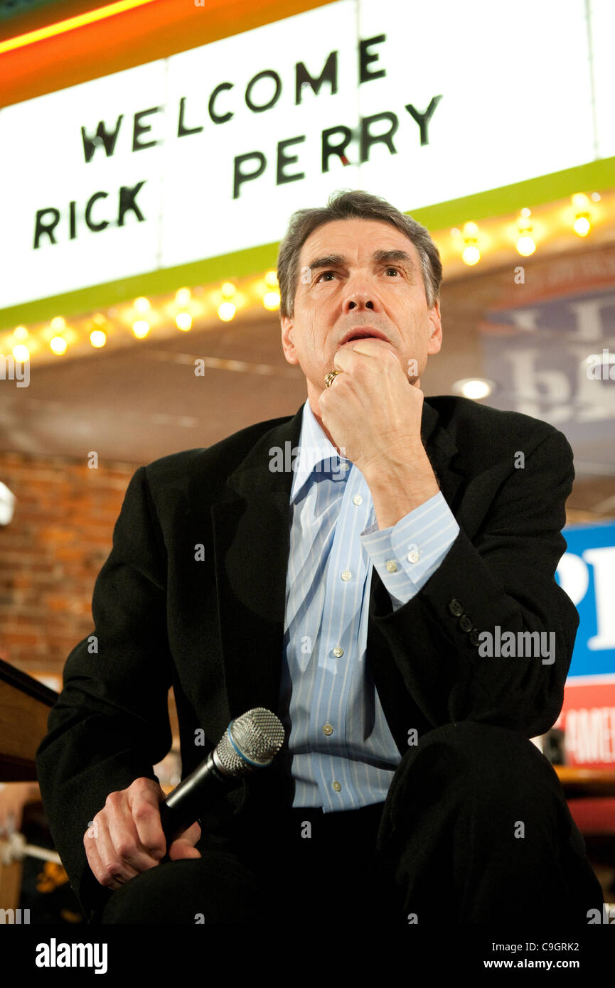 Republican presidential candidate Rick Perry listens to a question from ...