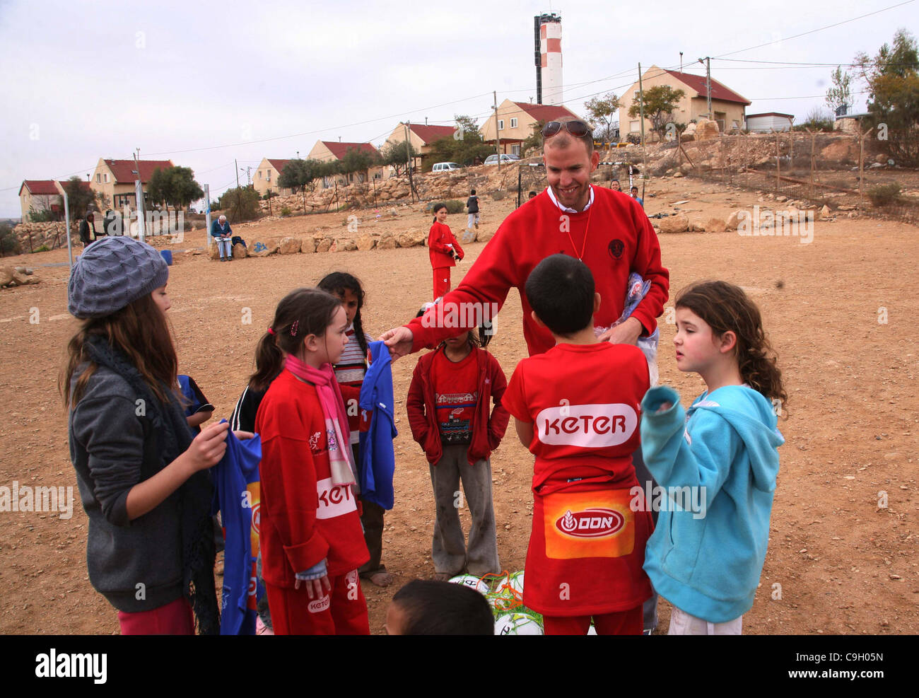 Palestinian children play football in hi-res stock photography and ...
