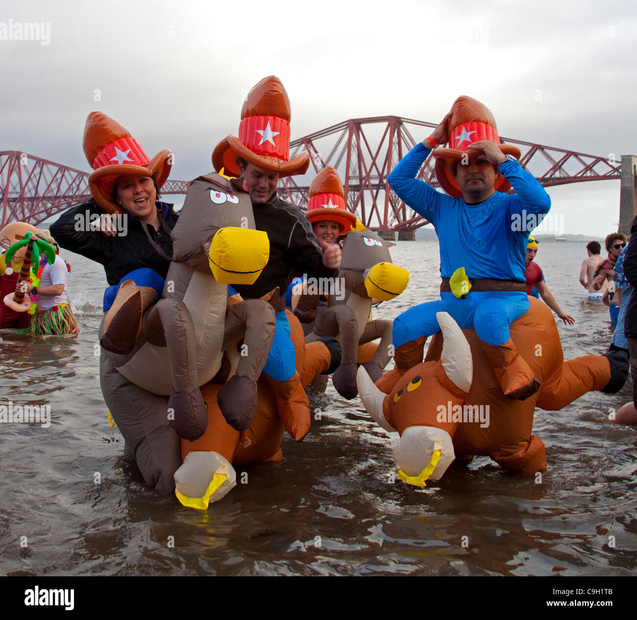 South Queensferry, UK. 1st Jan, 2012. "Loony Dook" annual splash for ...