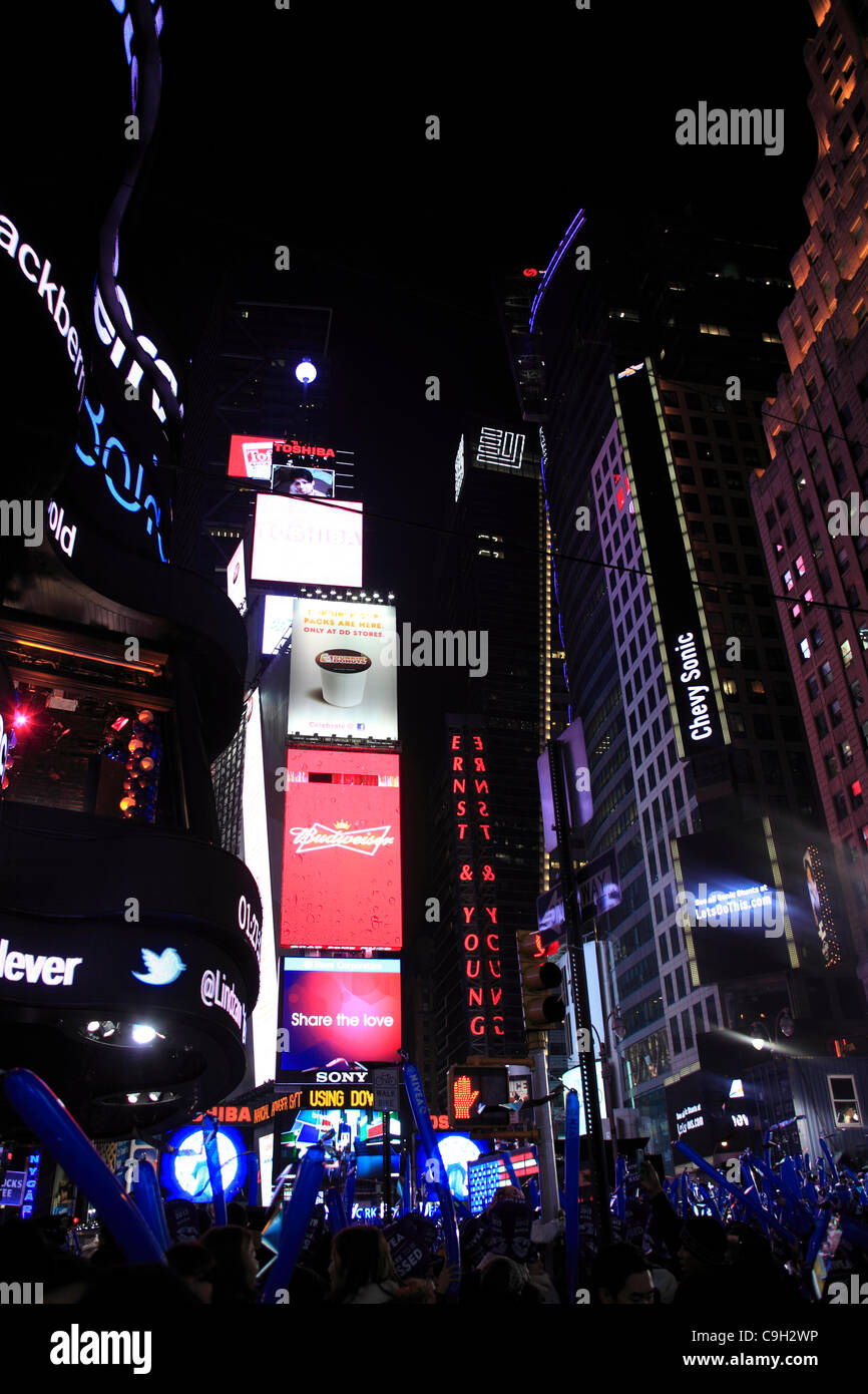 Revelers in Times Square wait for the ball to drop during Dick Clark's ...