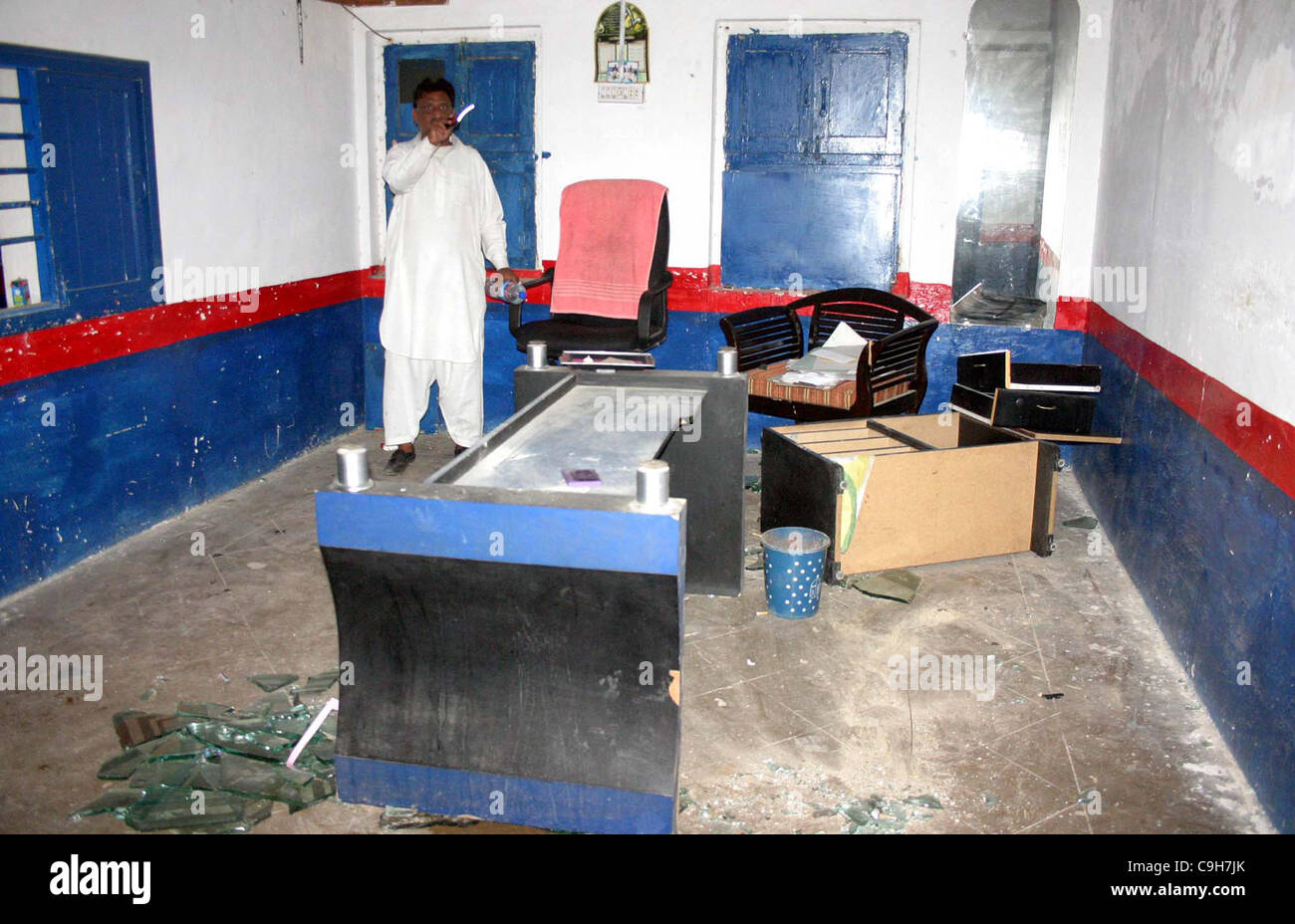 A man looks damaged office furniture hi-res stock photography and ...