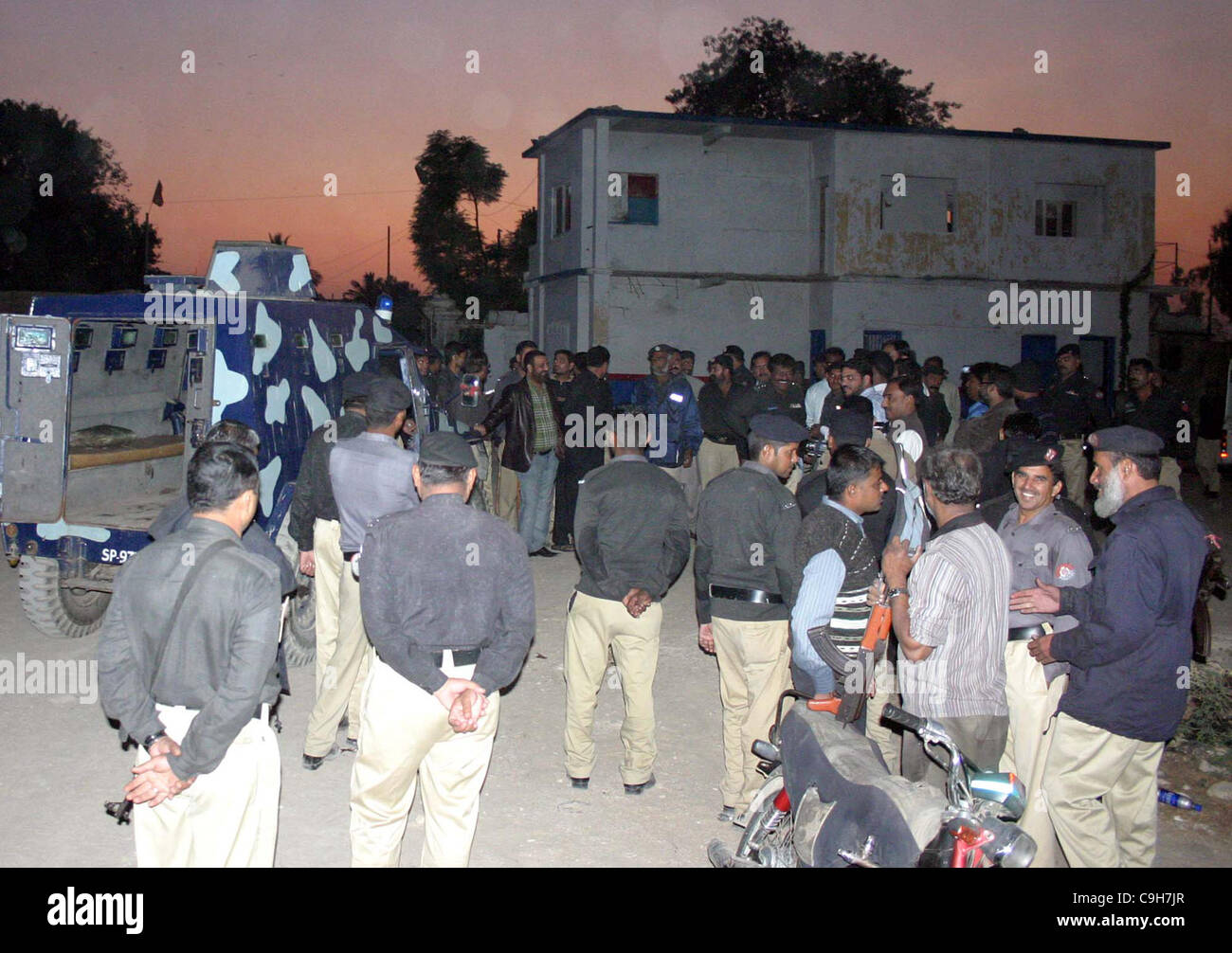 Angry mob attack against police operation hi-res stock photography and ...