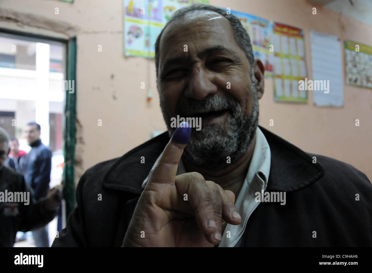 Jan. 3, 2012 - Egypt, Egypt - An Egyptian man shows her ink marked ...