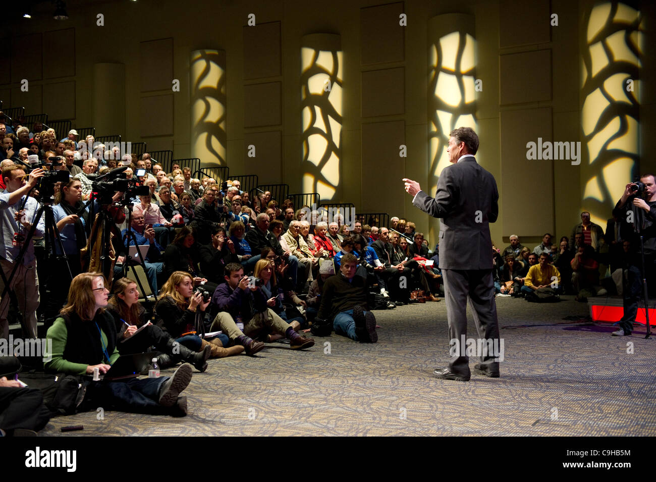 Republican presidential nominee candidate Rick Perry speaks at a caucus ...