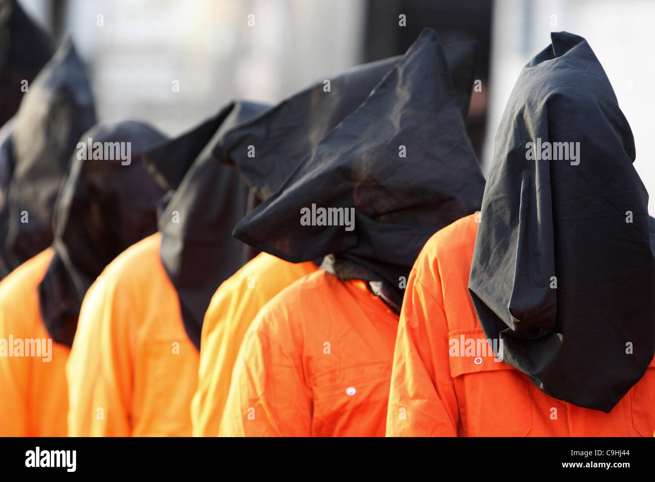 People wearing orange clothes protest in occasion of the 10th ...