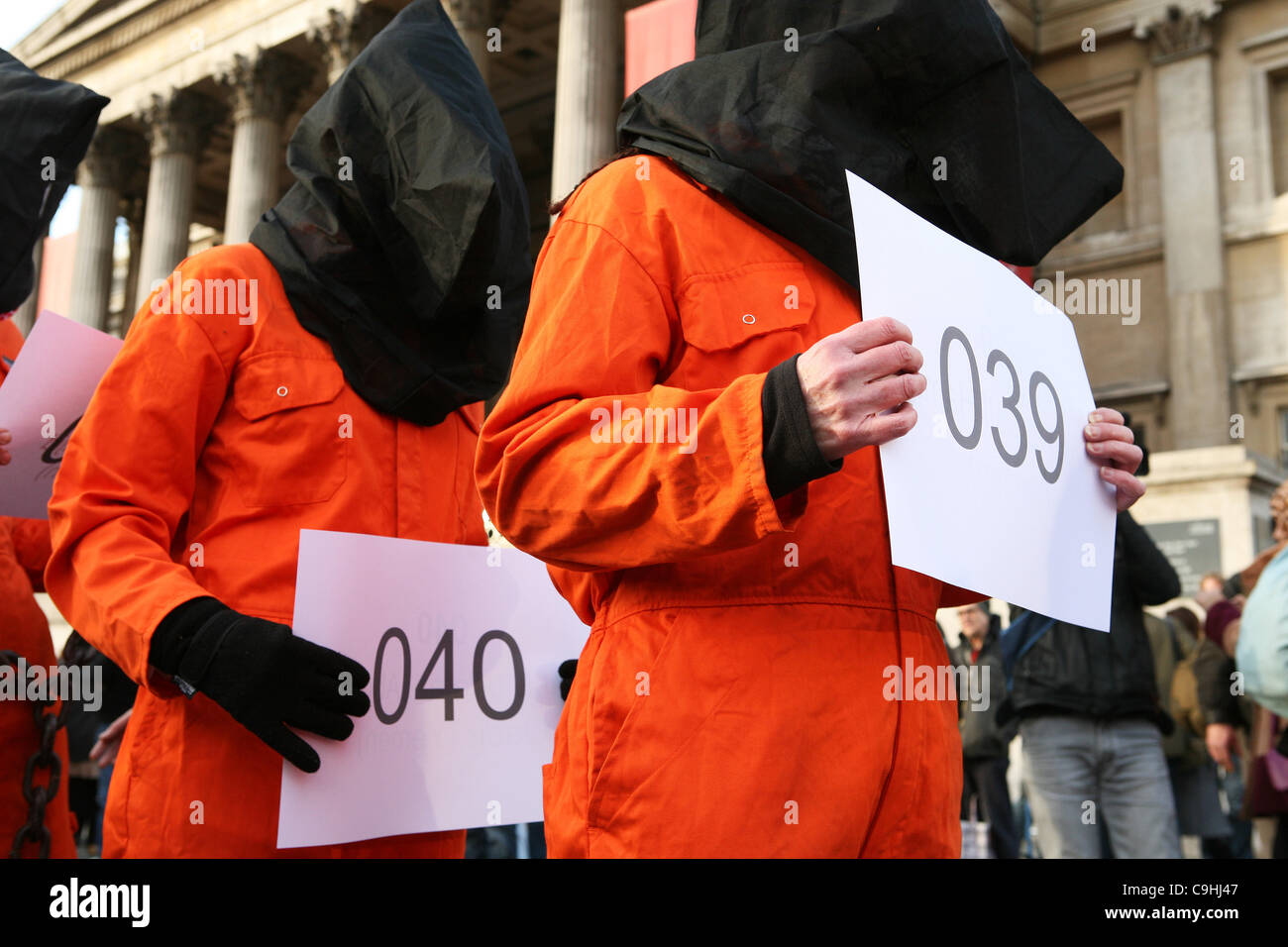 People wearing orange clothes protest in occasion of the 10th ...