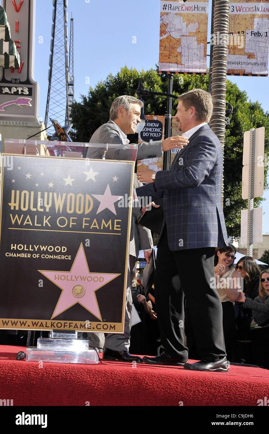 George Clooney, John Wells at the induction ceremony for Star on the ...