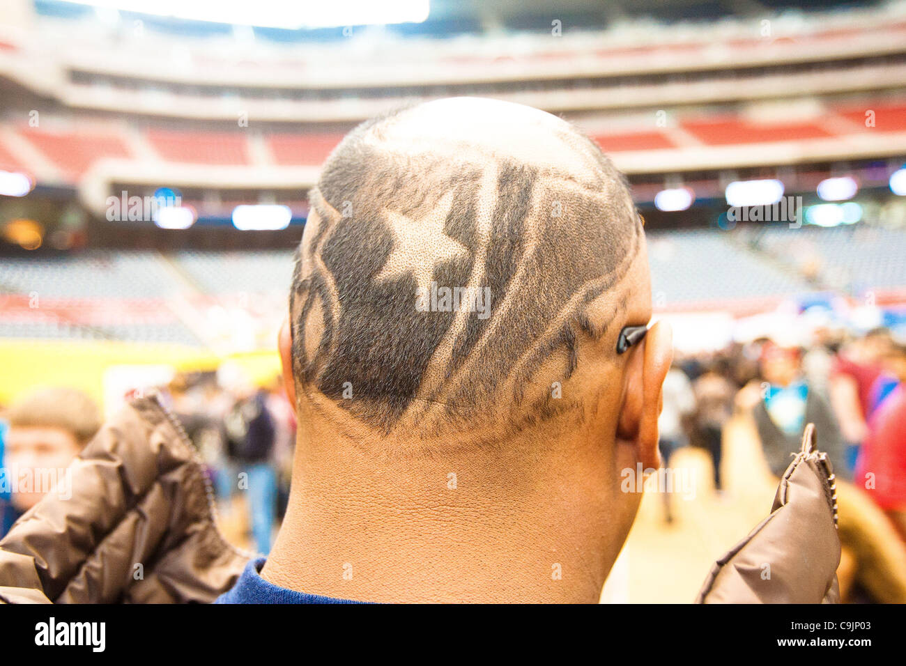 April 14, 2011 - Houston, Texas, U.S - A Houston Texans fan cuts his ...