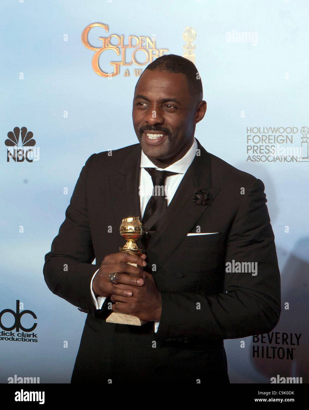 Actor Idris Elba poses in the press room with the Best Performance by ...