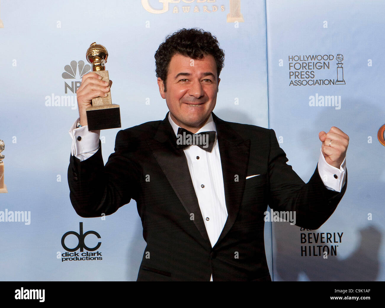 Composer Ludovic Bource poses in the press room at the 69th Annual ...