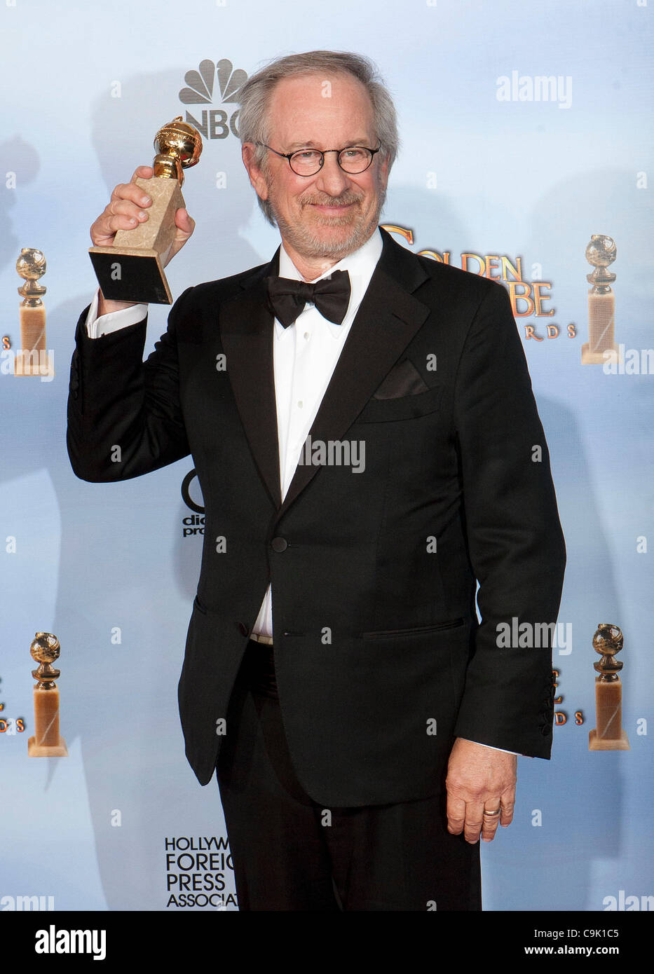 Director/producer Steven Spielberg poses in the press room with the ...