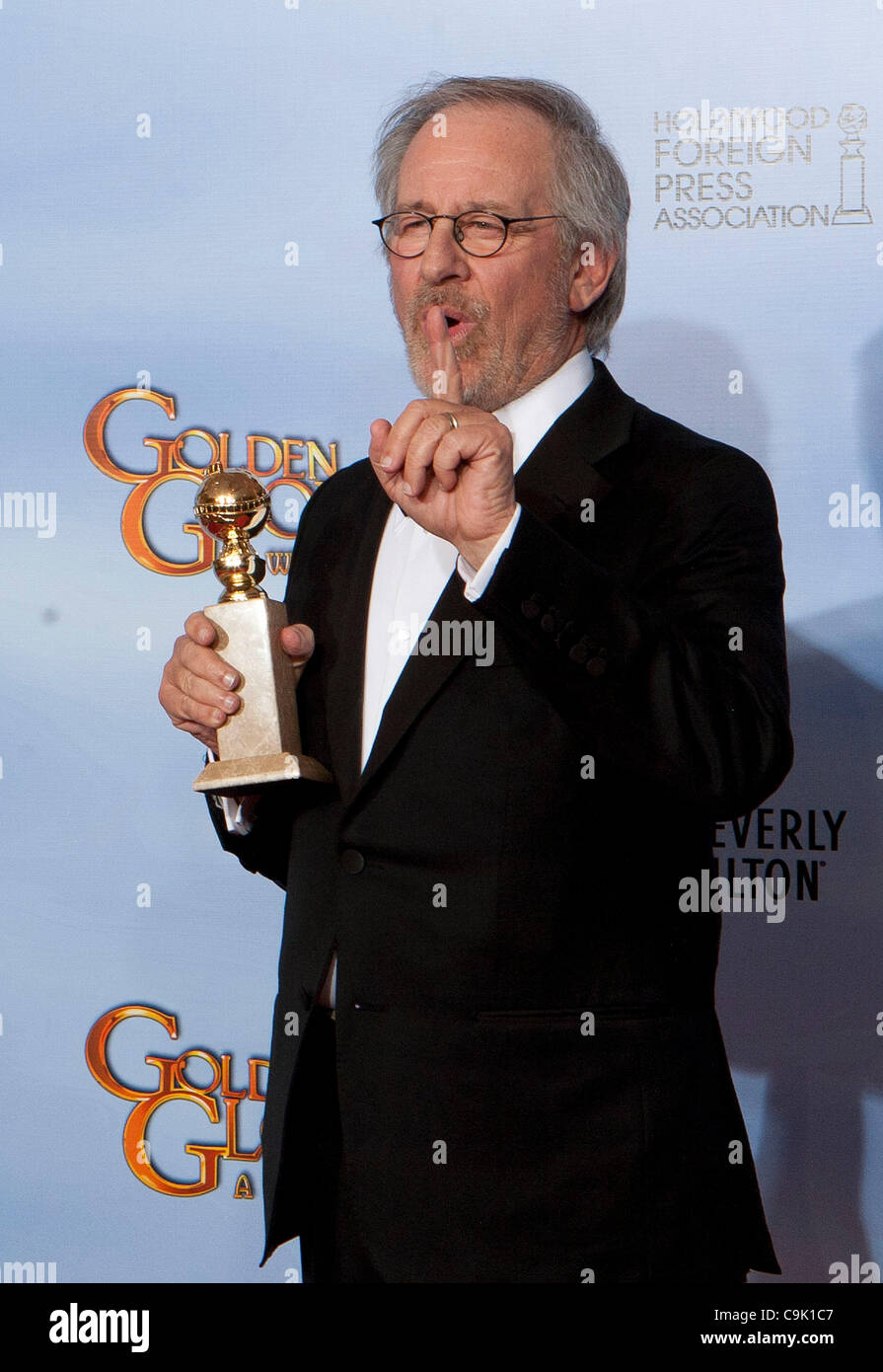 Director/producer Steven Spielberg poses in the press room with the ...