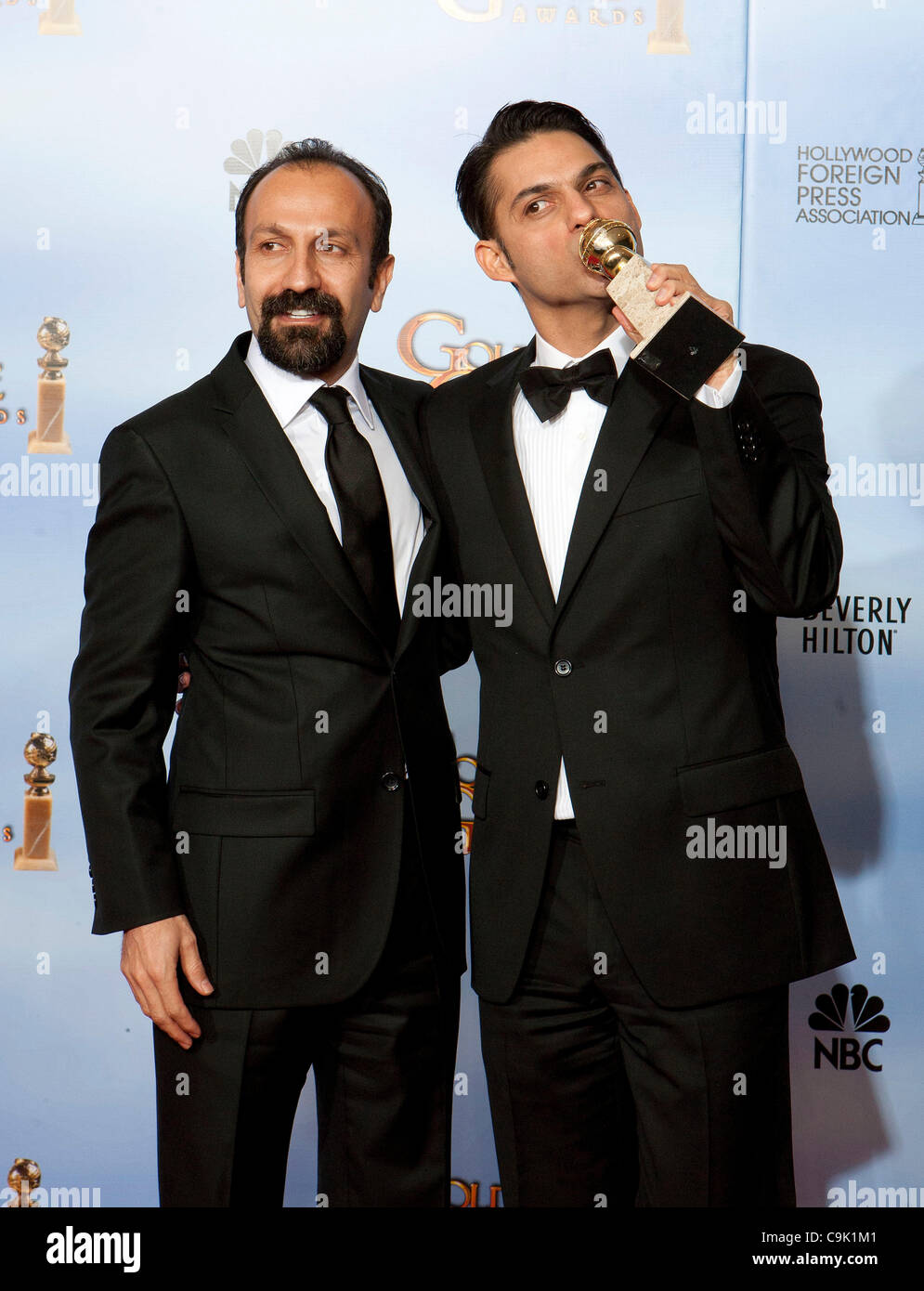 Director/writer Asghar Farhadi and actor Peyman Moadi pose in the press ...