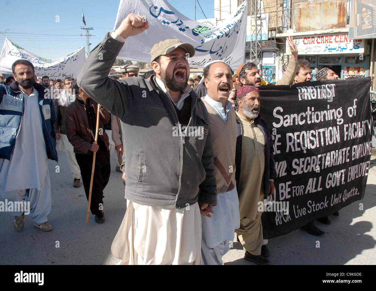 Members of All Pakistan Clerks Association (APCA) shout slogans in ...