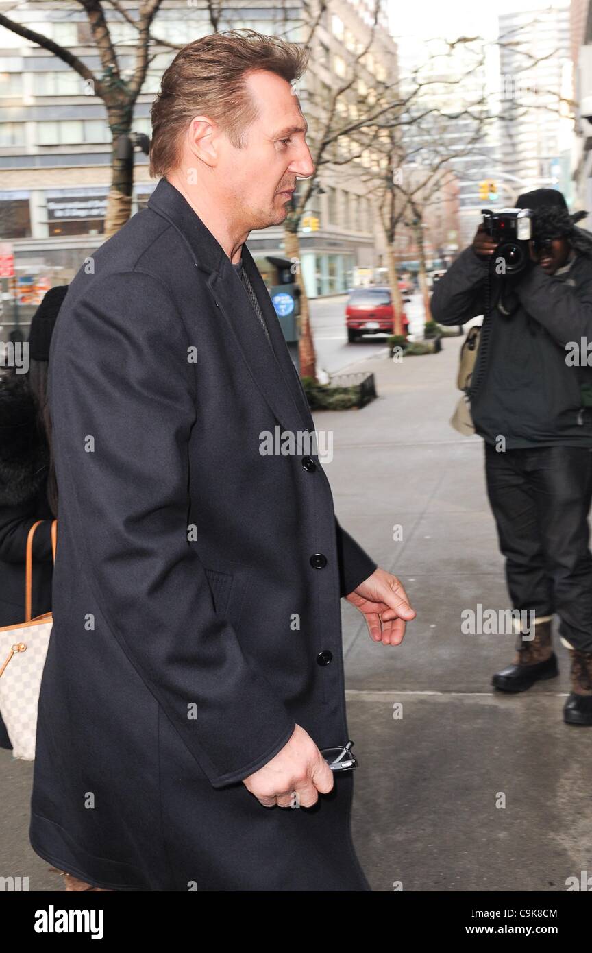 Liam Neeson, enters his Upper West Side apartment out and about for ...