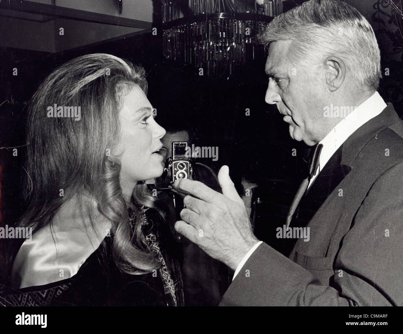 CARY GRANT with Dyan Cannon at a Hollywood dinner.(Credit Image: Â ...