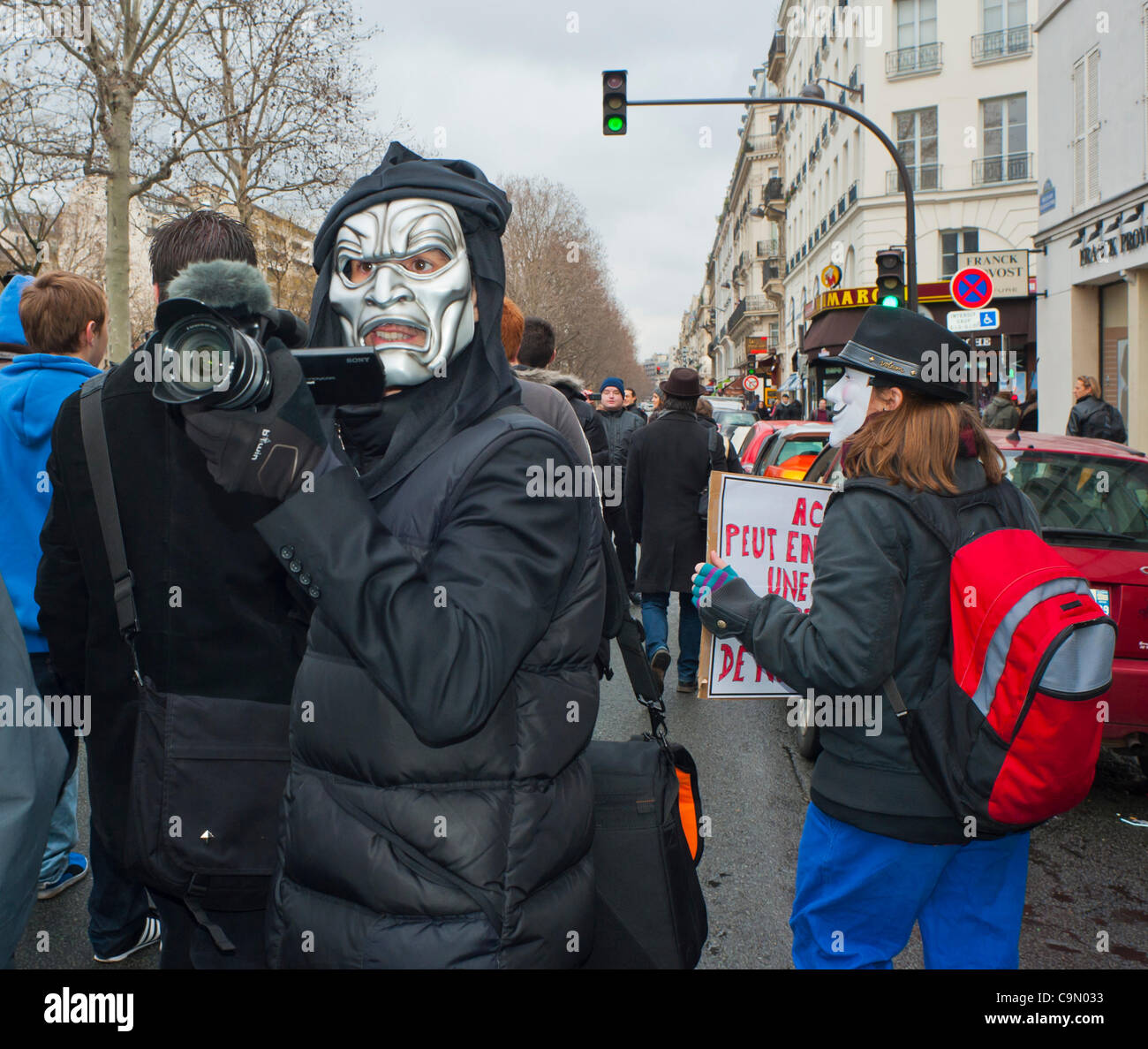 Paris france protesters anonymous mask hi-res stock photography and ...