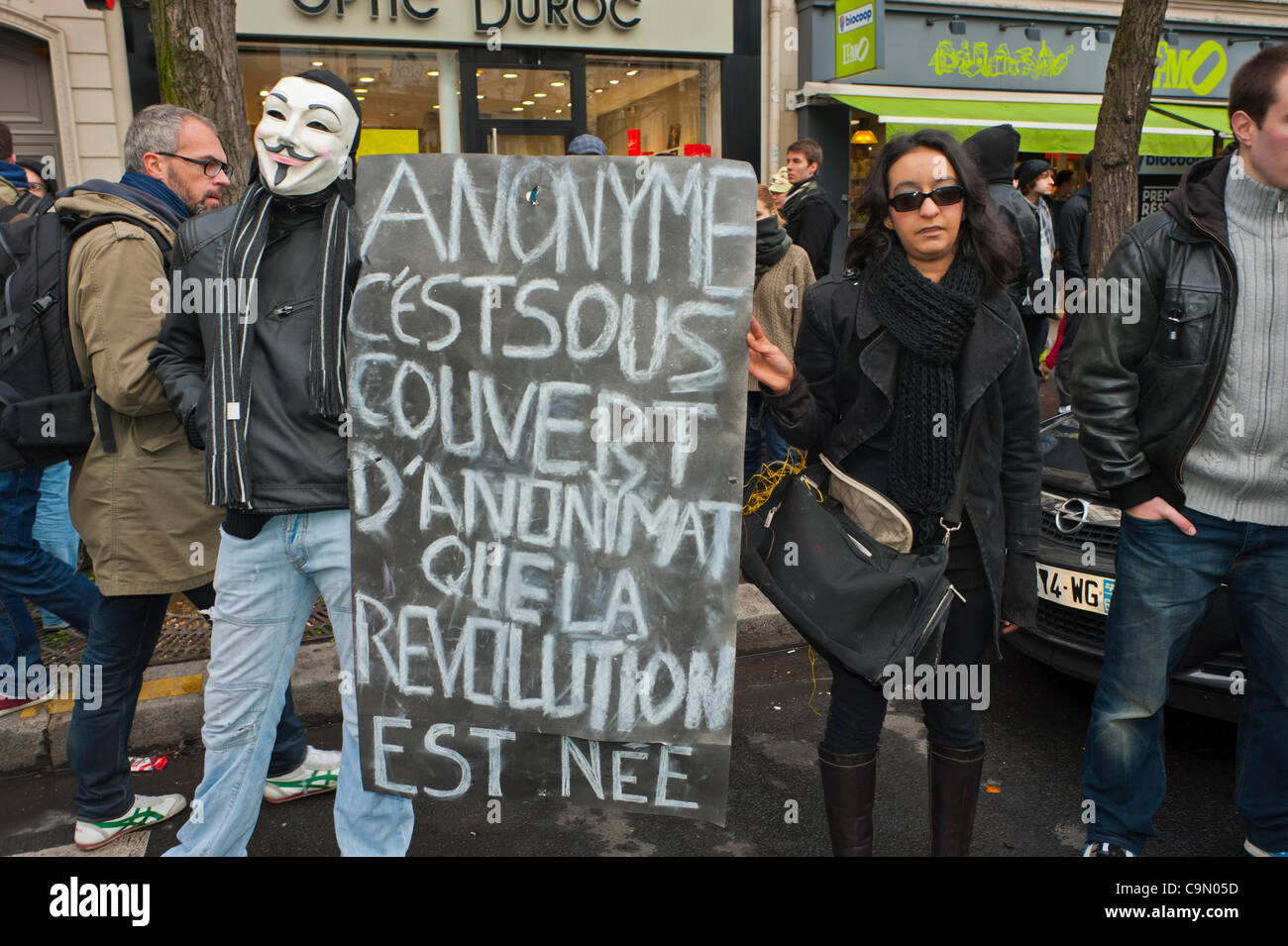 Paris france protesters anonymous mask hi-res stock photography and ...