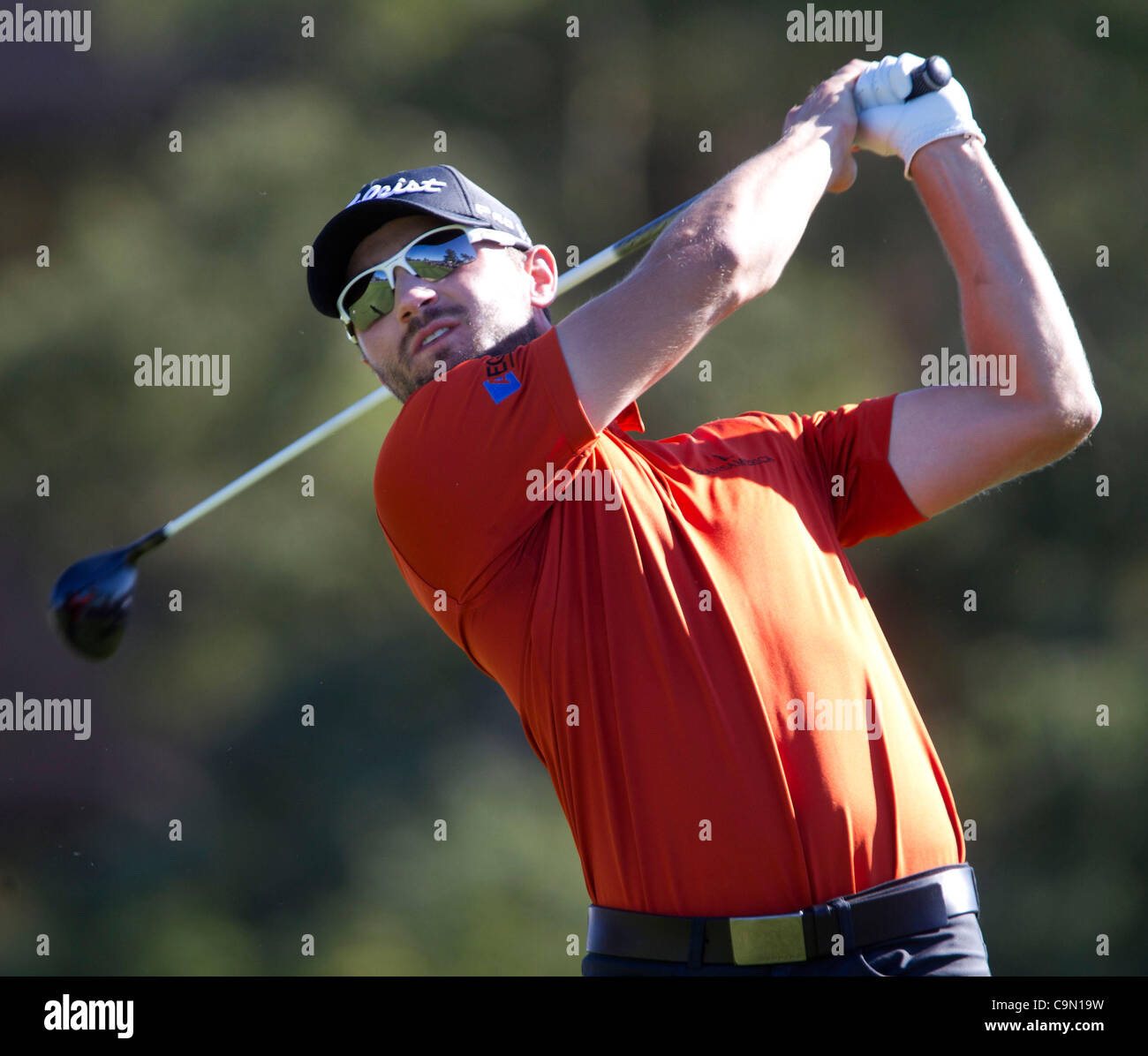 Jan. 28, 2012 - Kyle Stanley follows through on his swing after hitting ...