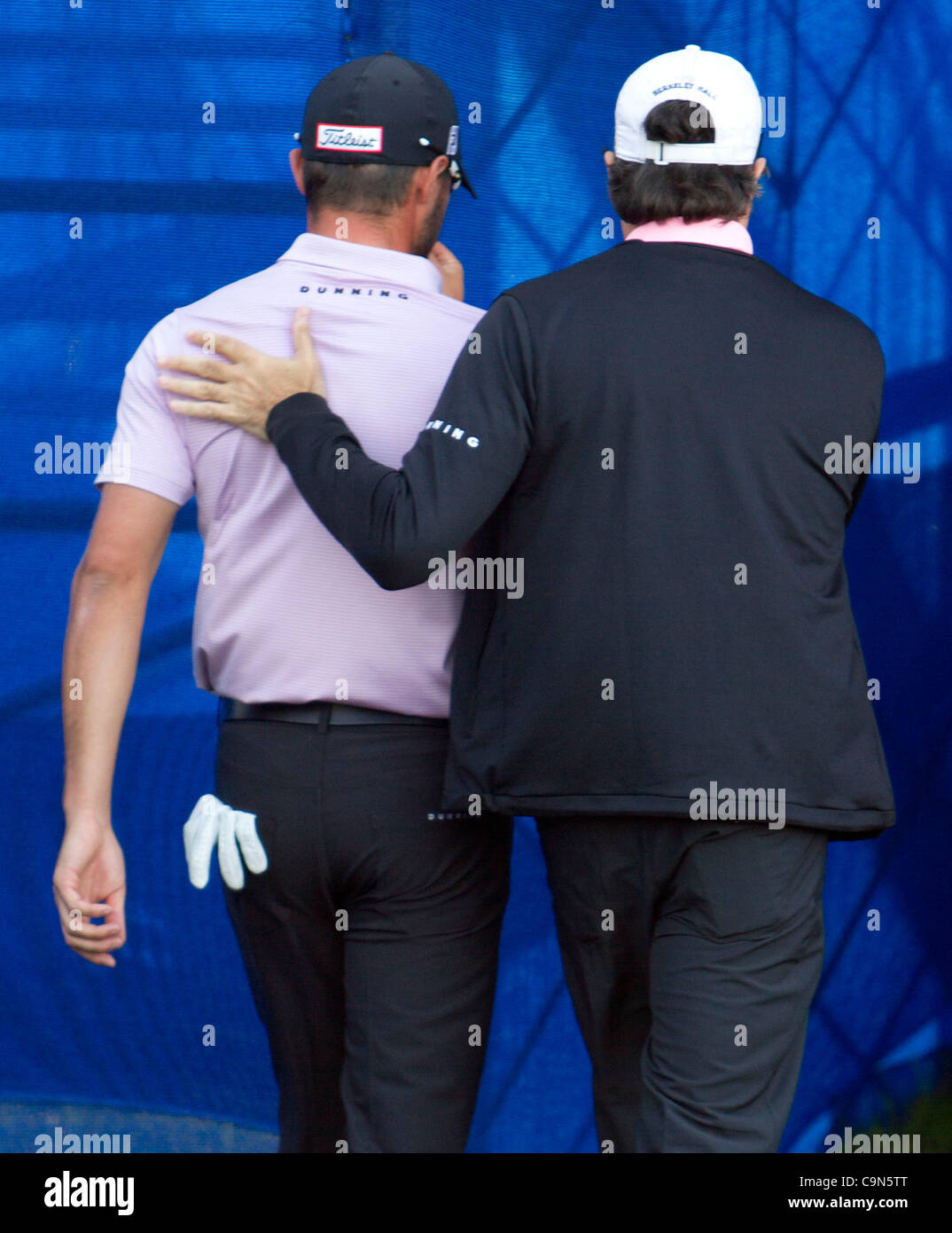 Jan. 28, 2012 - Kyle Stanley, left, is consoled as he walks away from ...