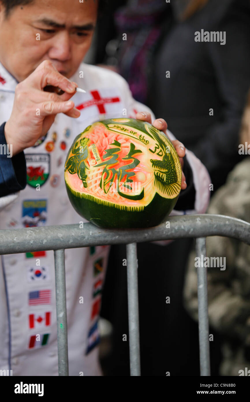 Carving intricate design into a melon Stock Photo - Alamy